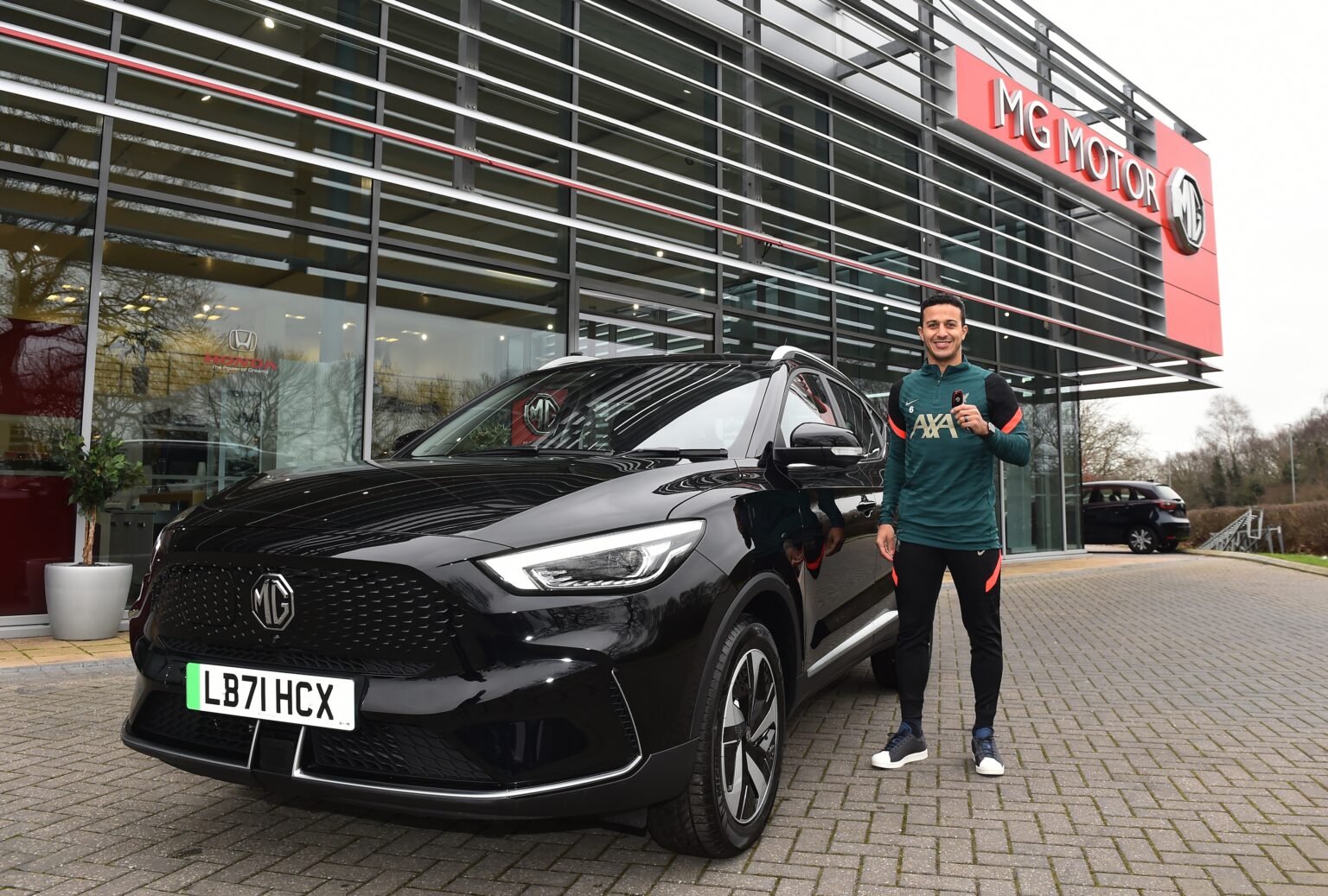 Football star takes delivery of new electric MG - MG Car Club